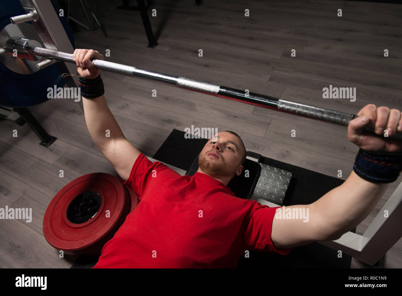 Professional Athlete Is Lying and Is Holding a Very Heavy Barbell Stock ...