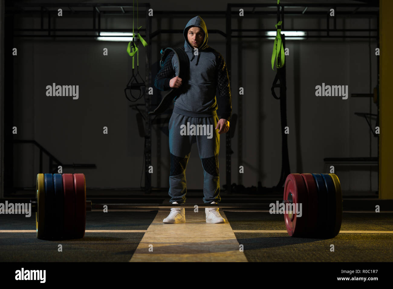 Strong Man Ready to Lift Heavy Barbell From Floor During Powerlifting ...