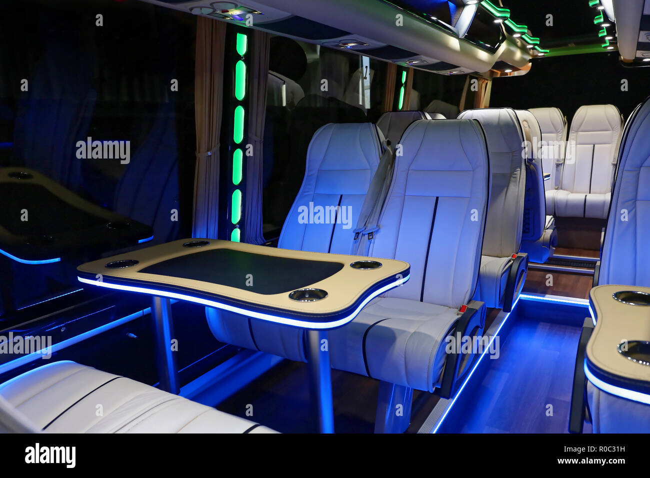 Bus Coach Interior Table and Leather Seats Stock Photo - Alamy