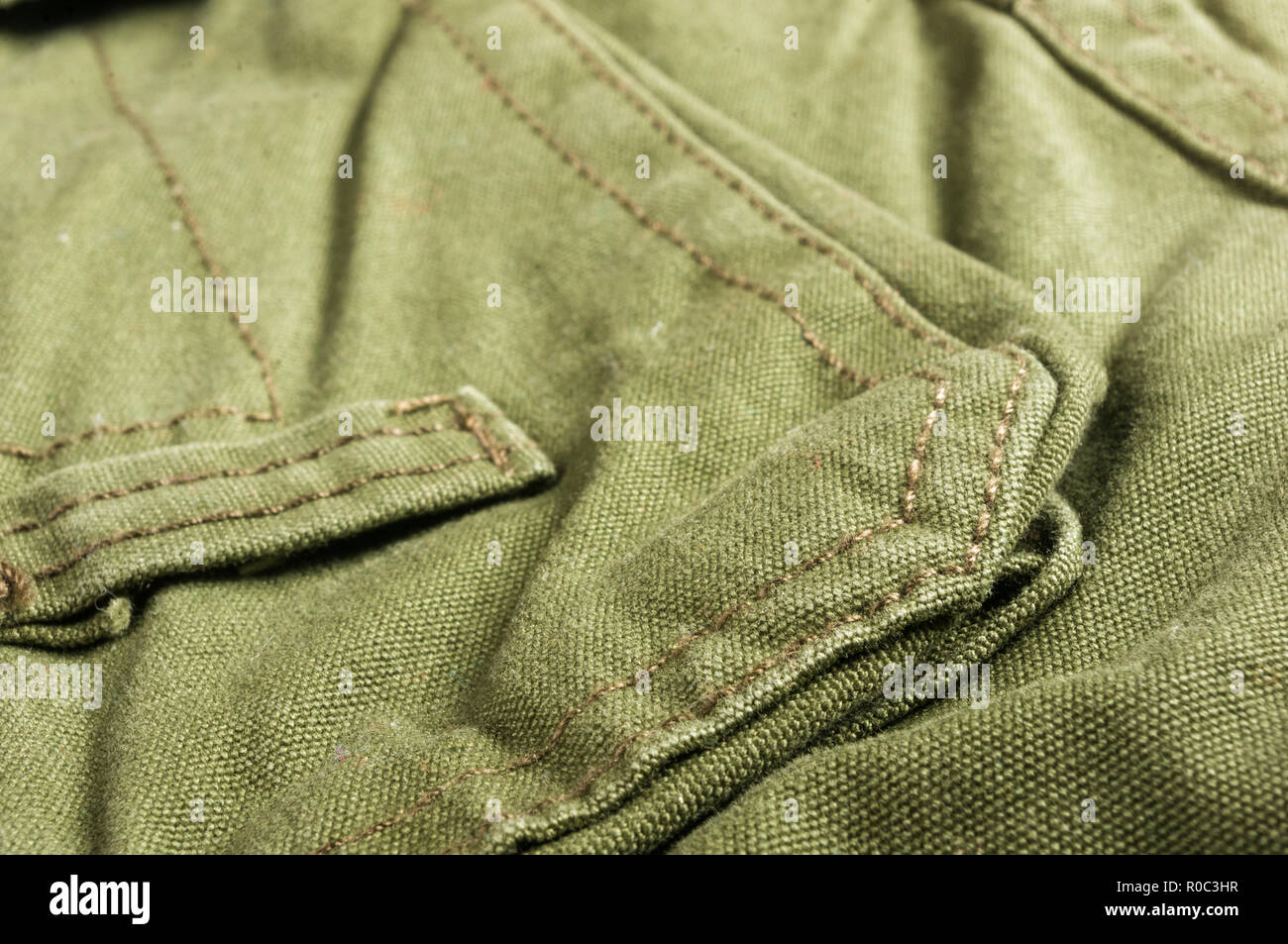 clothing items washed cotton fabric texture with seams, macro, close-up ...