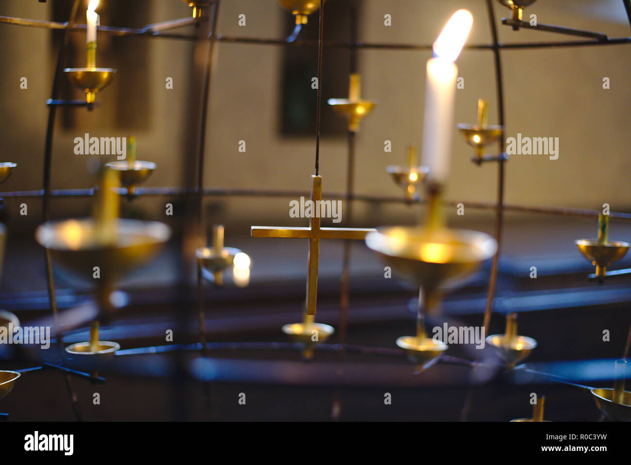Christian cross and candle Stock Photo - Alamy