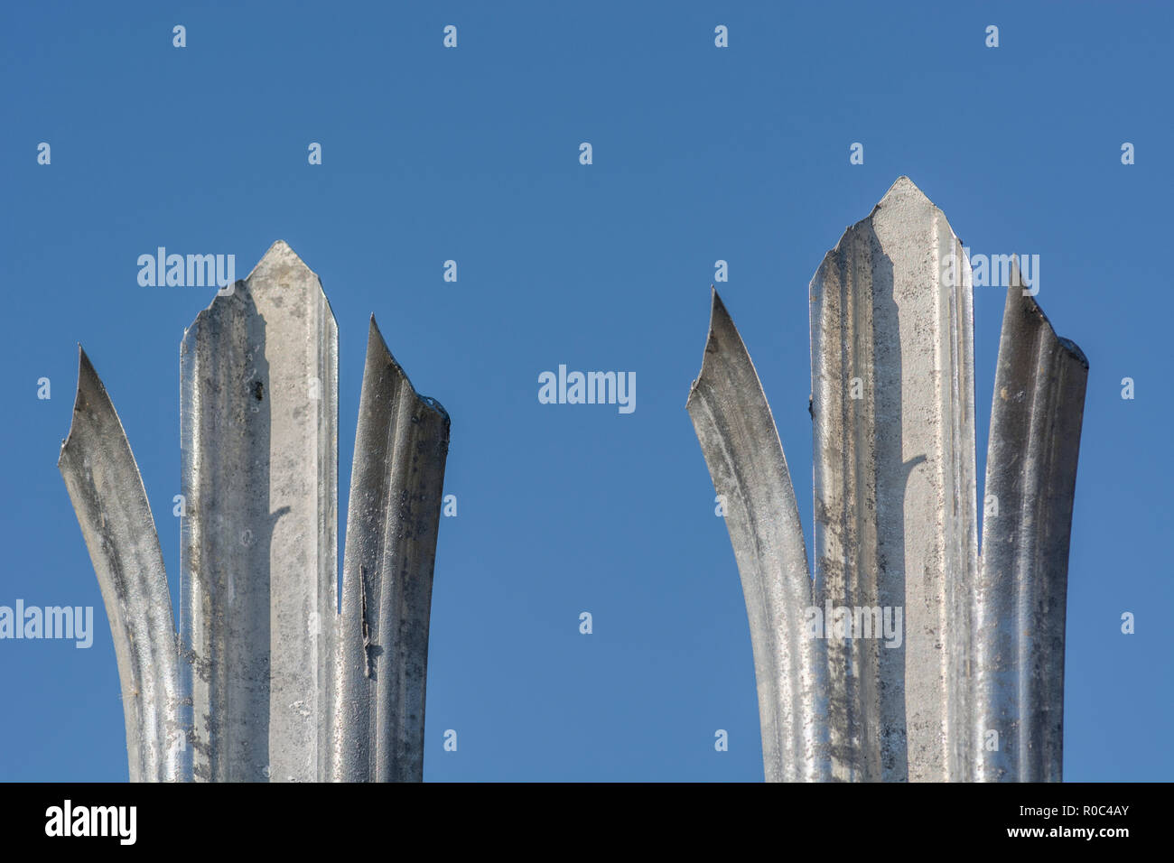 Robust galvanised anti-climb steel fence - metaphor 'Keep Out', concept ...