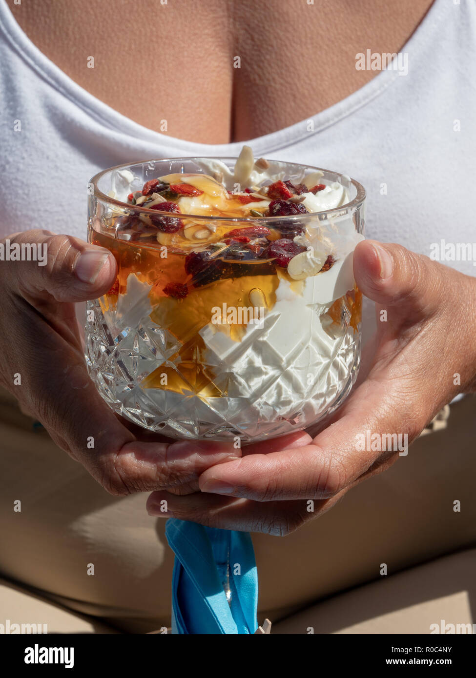 Fruit sundae held by woman Stock Photo - Alamy