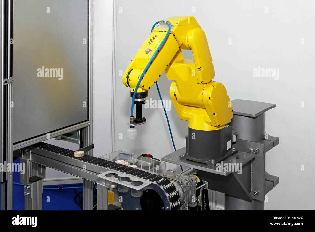 Robotic arm at production line in factory Stock Photo - Alamy