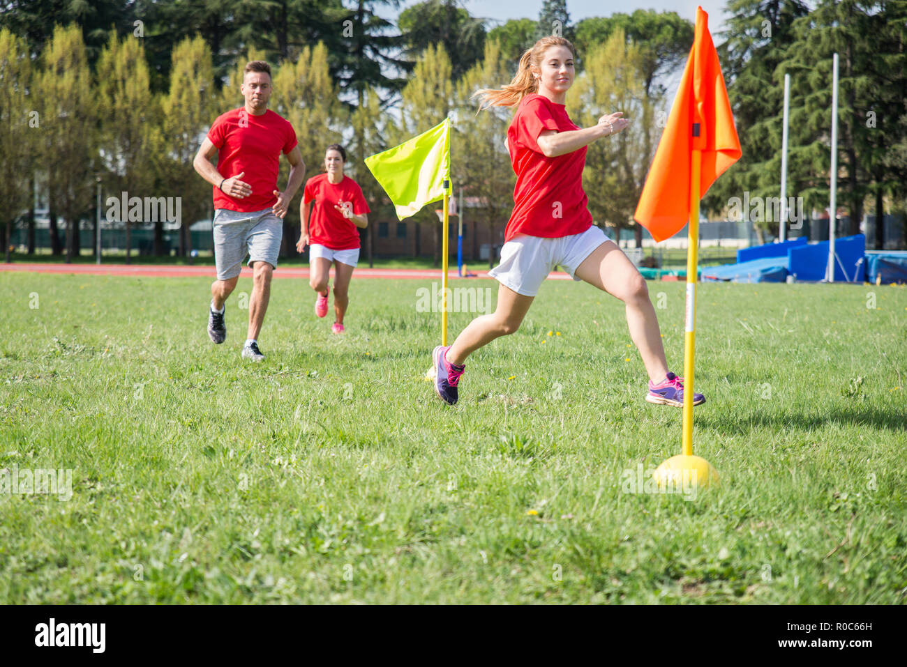 Football players training in soccer field, concepts about teamwork and ...