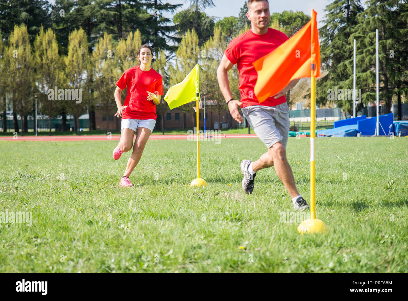 Football players training in soccer field, concepts about teamwork and ...