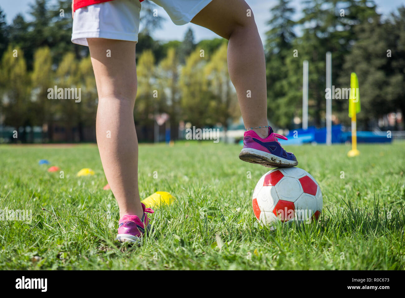 Football players training in soccer field, concepts about teamwork and ...