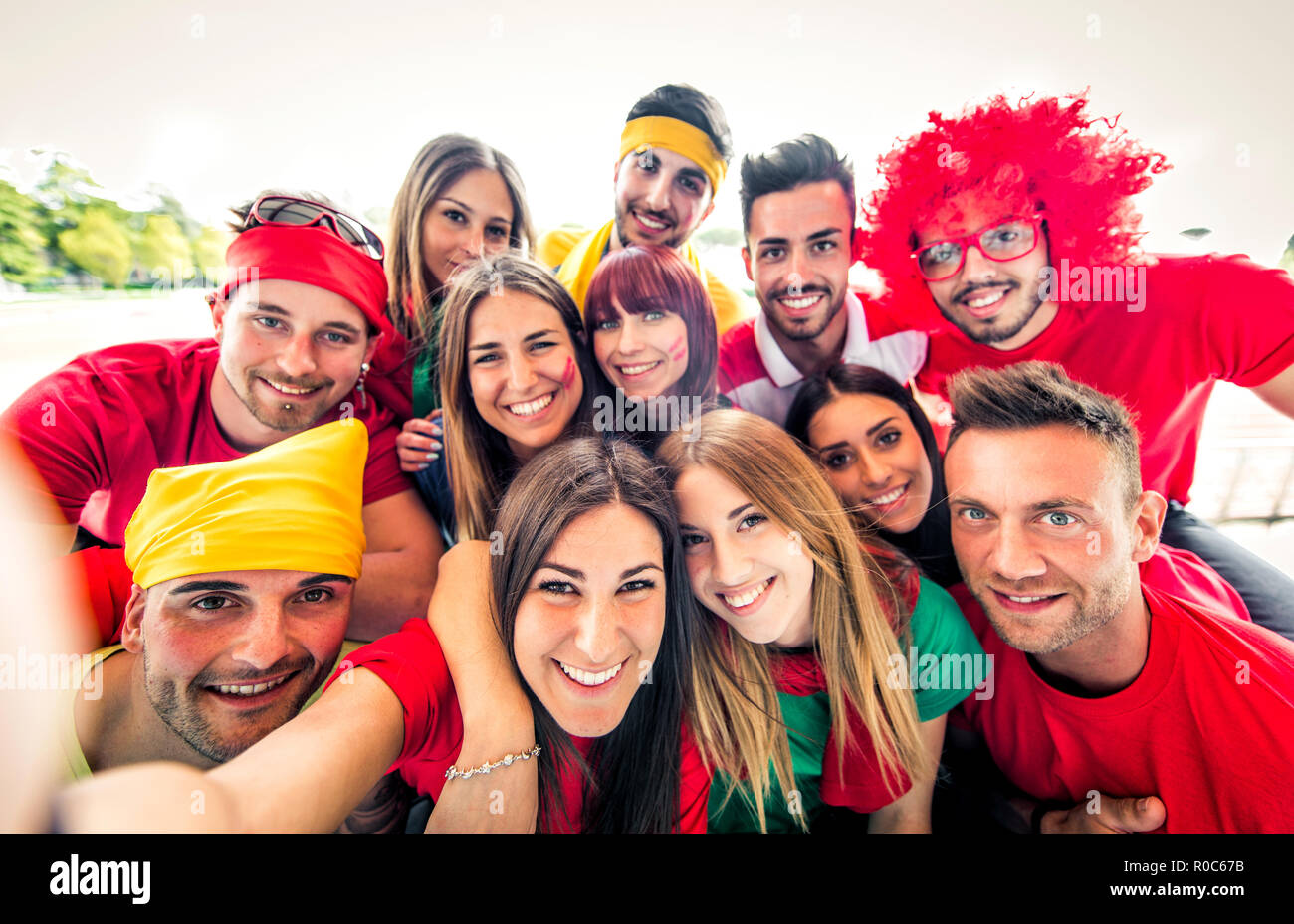 Group of football fans taking a selfie at thestadium Stock Photo - Alamy