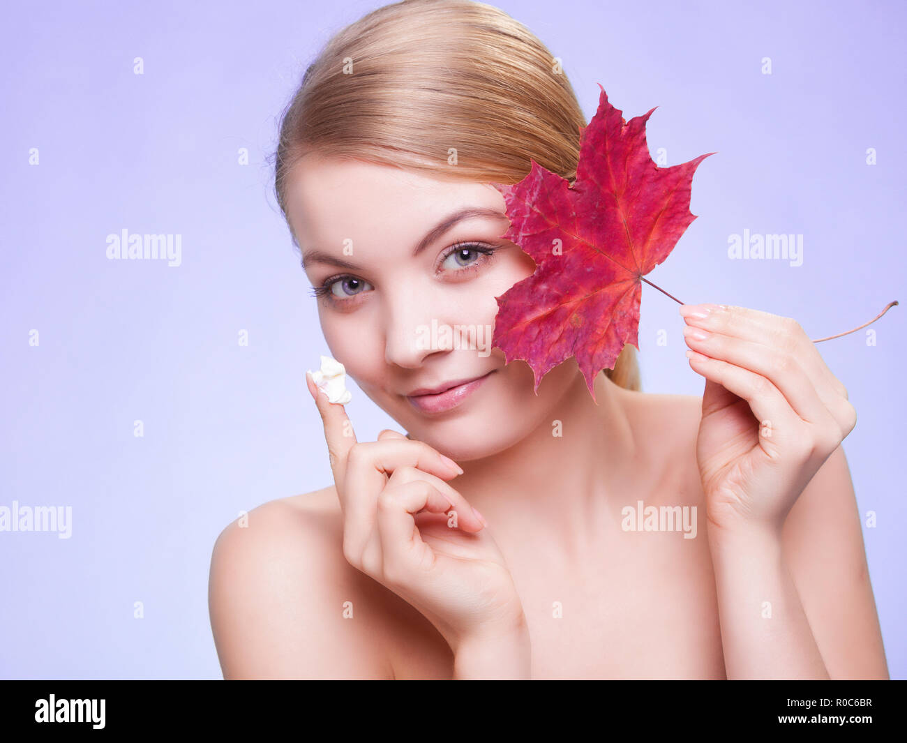 Skincare habits. Face of young woman with leaf as symbol of red ...