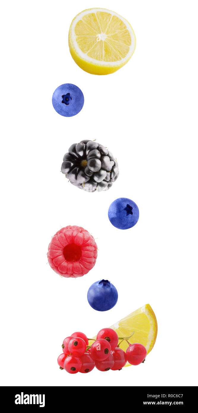 Flying fresh berries and lemon isolated on white background Stock Photo ...