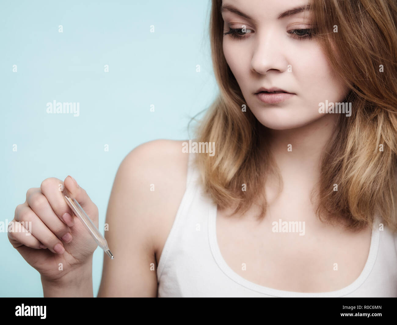 Flu cold grippe. Woman having high temperature. Sick girl with fever ...