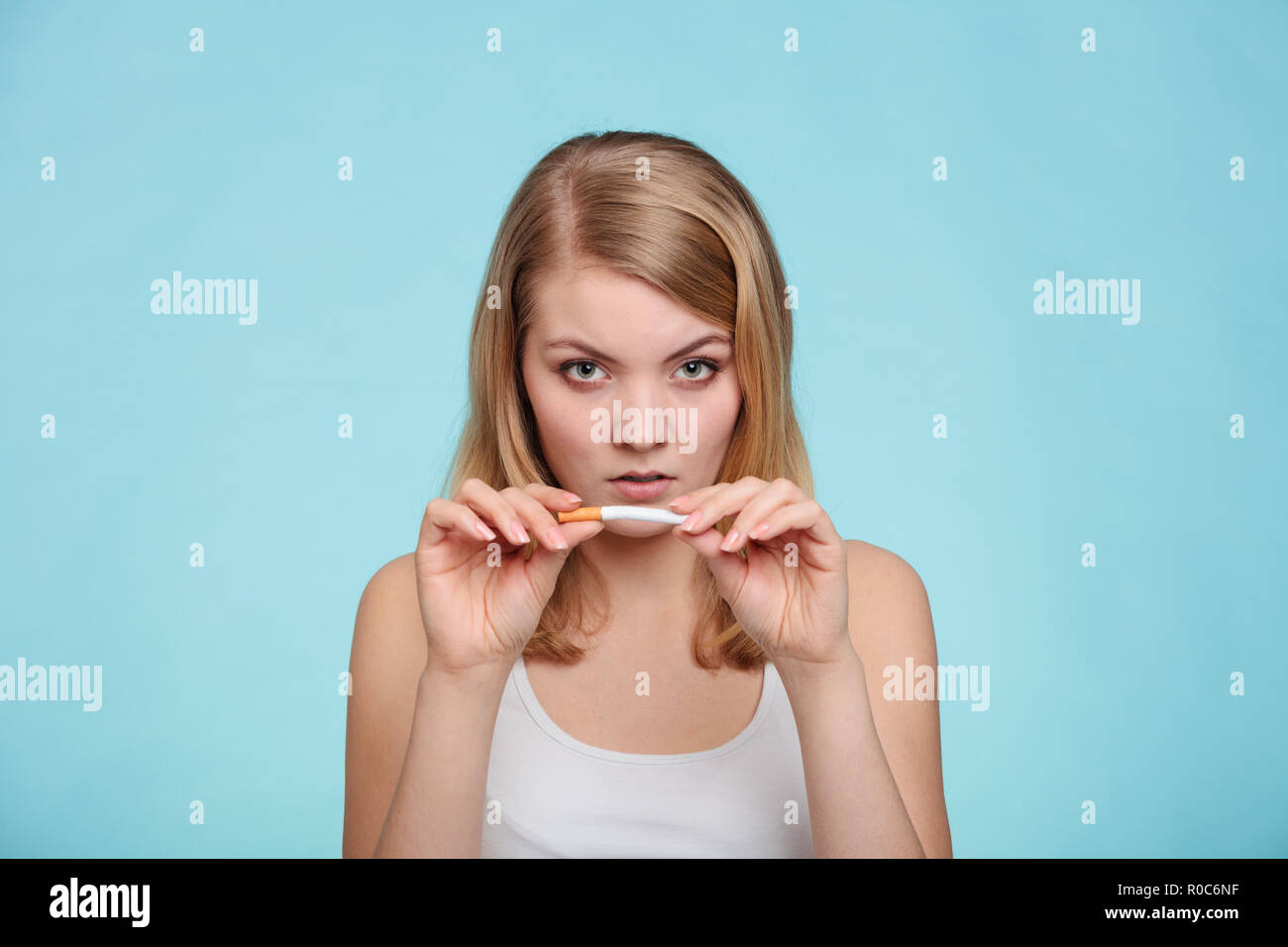 Pretty girl breake down cigarette. Addicted nicotine problems in young ...