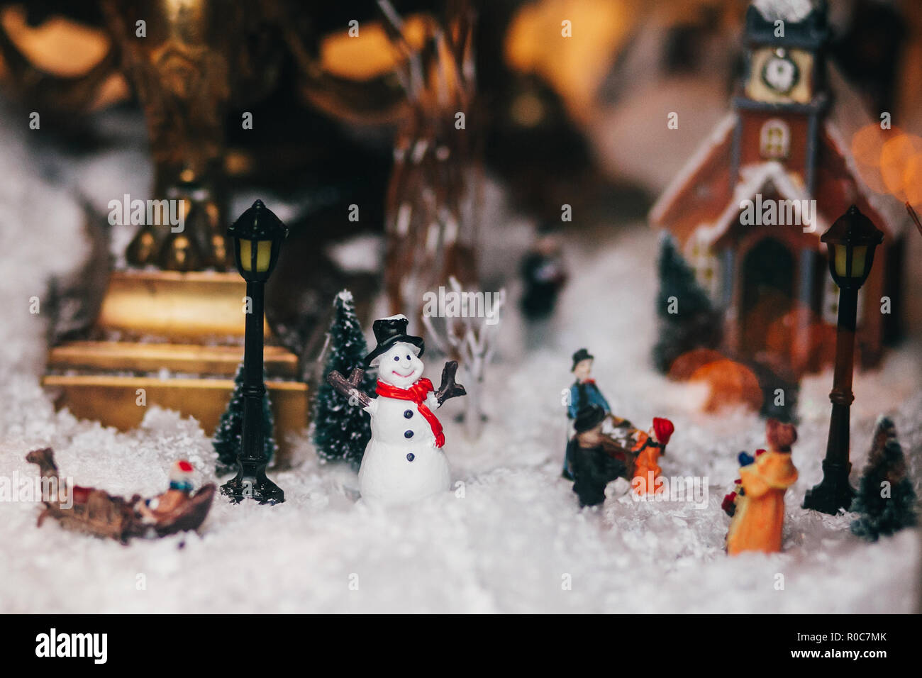 Magic Little Christmas city in miniature with snow,snowman, lights ...