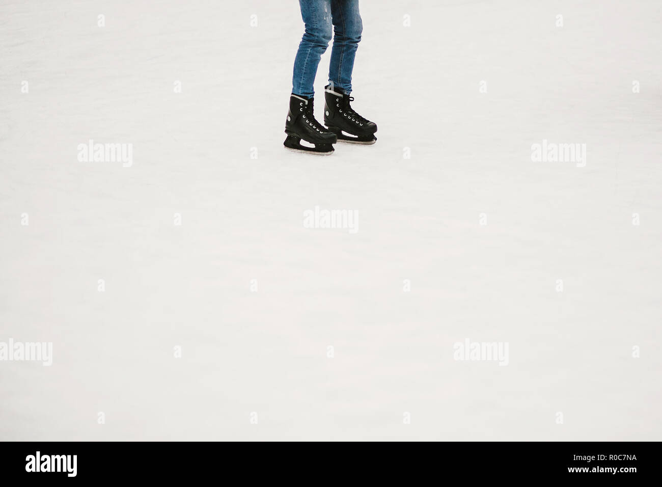 Skaters skating on iceskating ring in european city center in winter ...