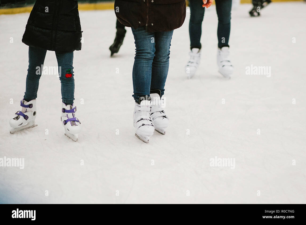 Skaters skating on iceskating ring in european city center in winter ...