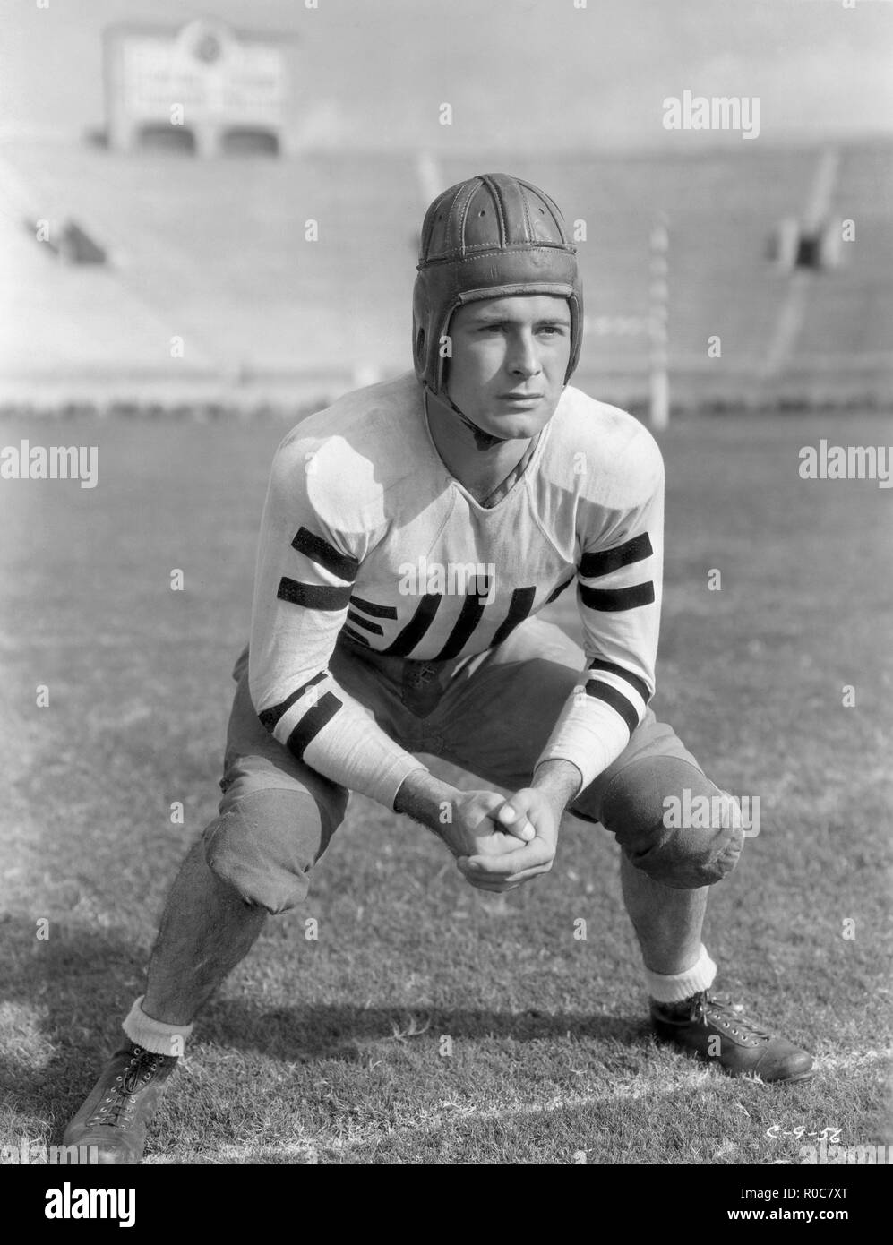 Actor Richard Arlen on-set of the Film, "The All American", Universal ...