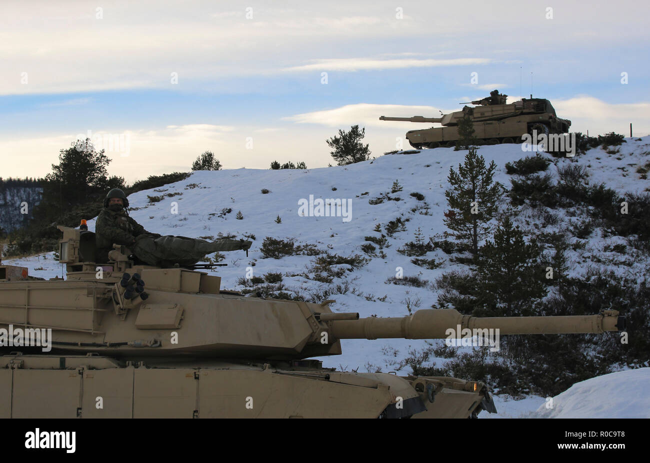 U.S. Marines with 2nd Tank Battalion, 2D Marine Division, advance on ...