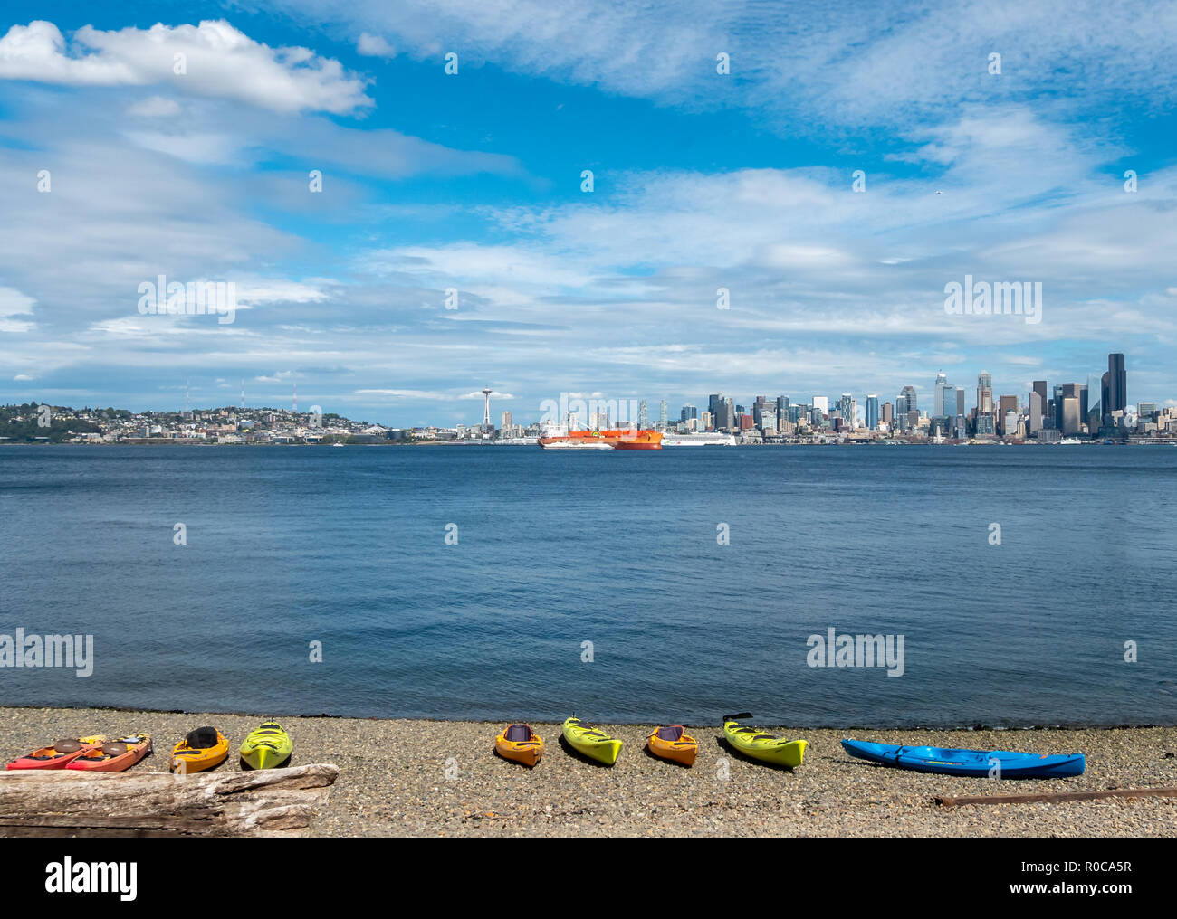 Kayak By Ocean Shoreline with Downtown Seattle Skyline in the ...