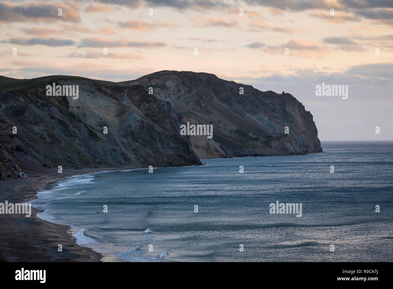 Rocky and sandy shoreline in the Magdalen Islands, Quebec, Canada Stock ...