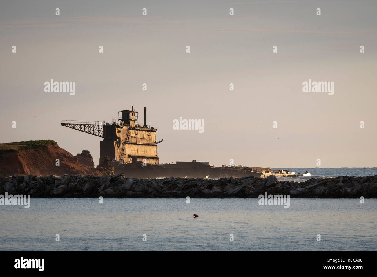 Wreck of a floating drydock section outside the harbour at L'Etang du ...