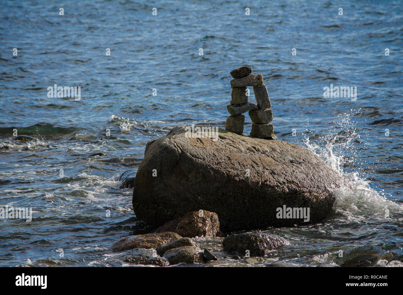 Stone symbol inukshuk in english bay hi-res stock photography and ...