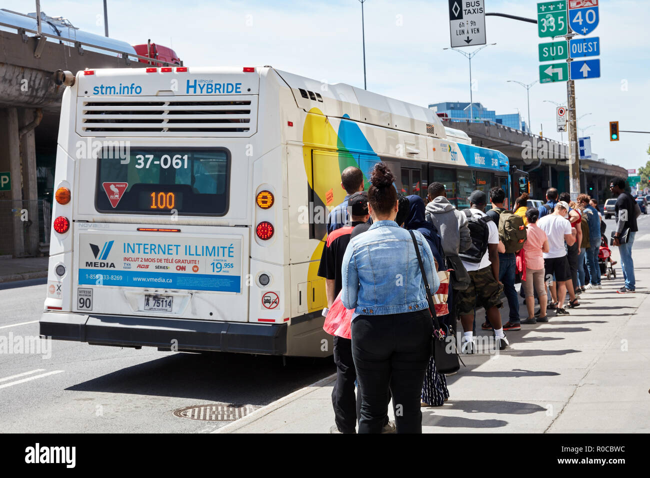 Queue people waiting bus stop hi-res stock photography and images - Alamy