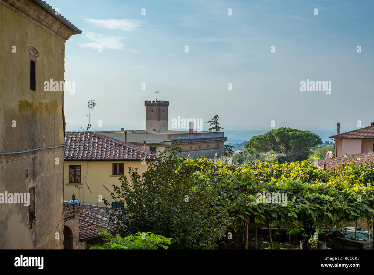 Roofs, towers and hills around the medieval town of Guardistallo in ...