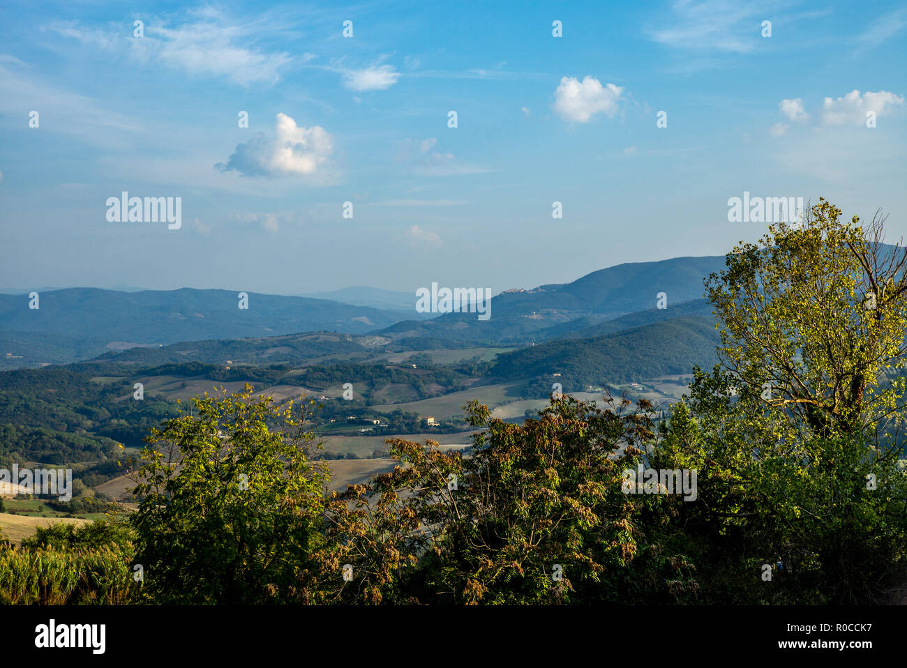 Roofs, towers and hills around the medieval town of Guardistallo in ...