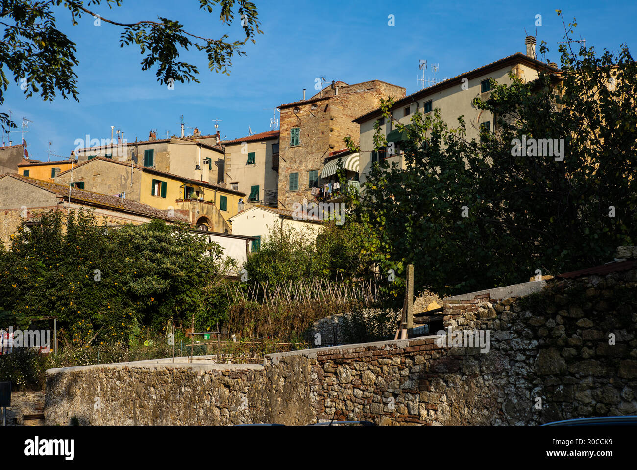 Roofs, towers and hills around the medieval town of Guardistallo in ...