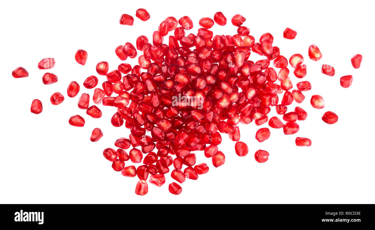 Pomegranate seeds isolated on white background, with empty space for ...
