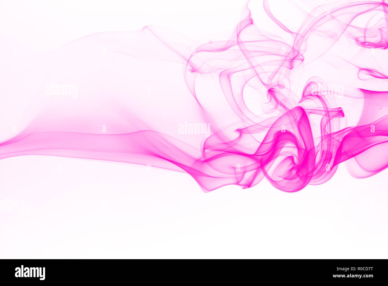 Beautiful pink smoke abstract on white background Stock Photo - Alamy