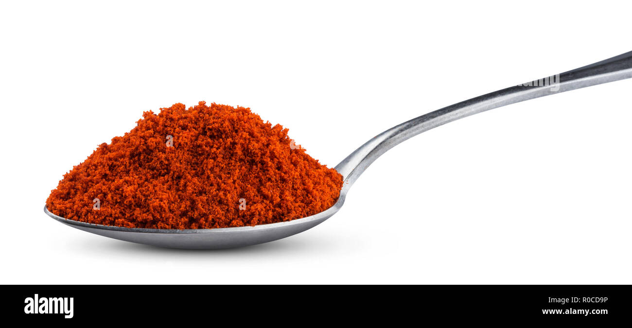 Ground red paprika in spoon isolated on white background Stock Photo ...