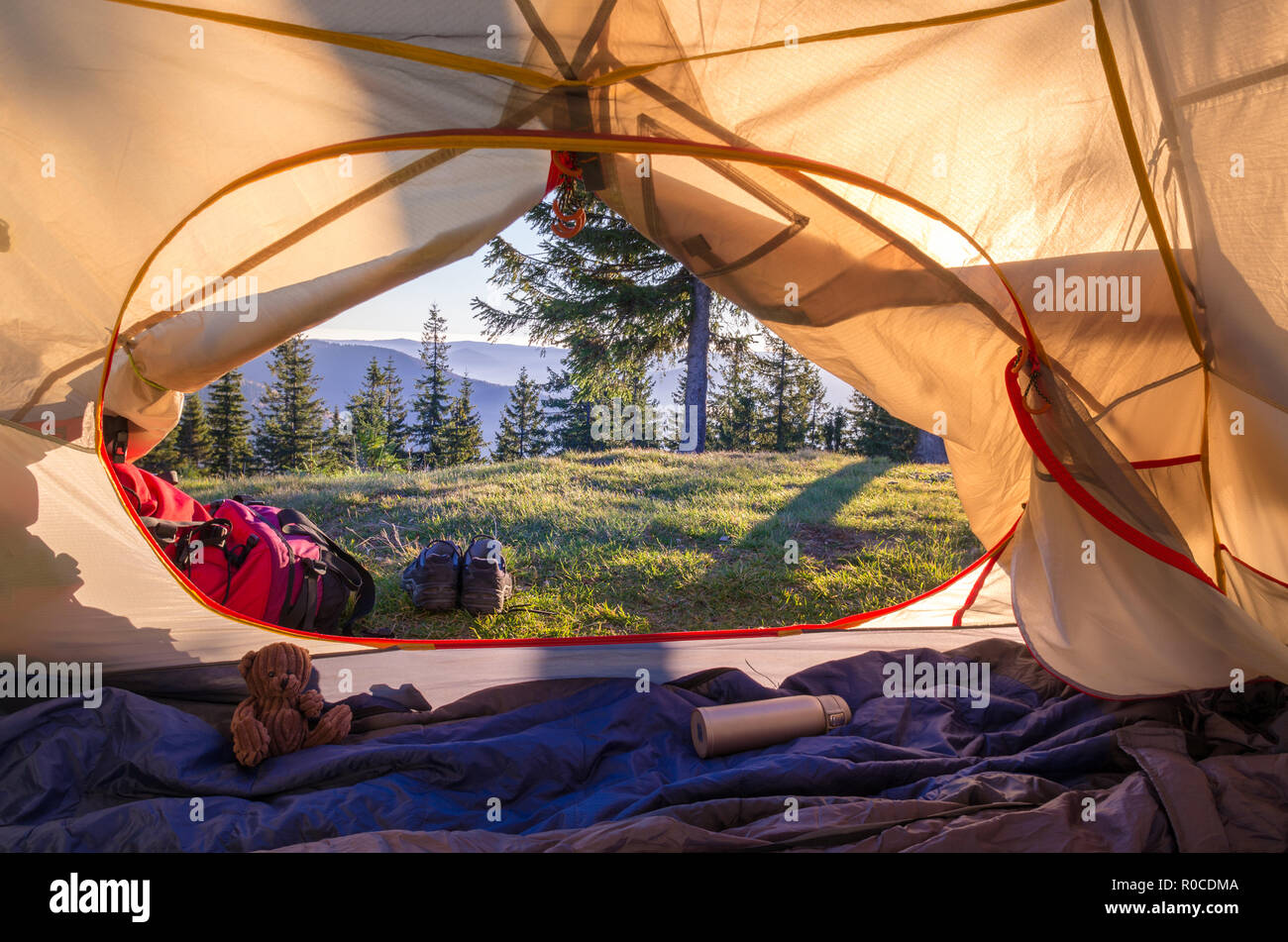 View of the mountains from the tent. View from a tourist tent. A window ...