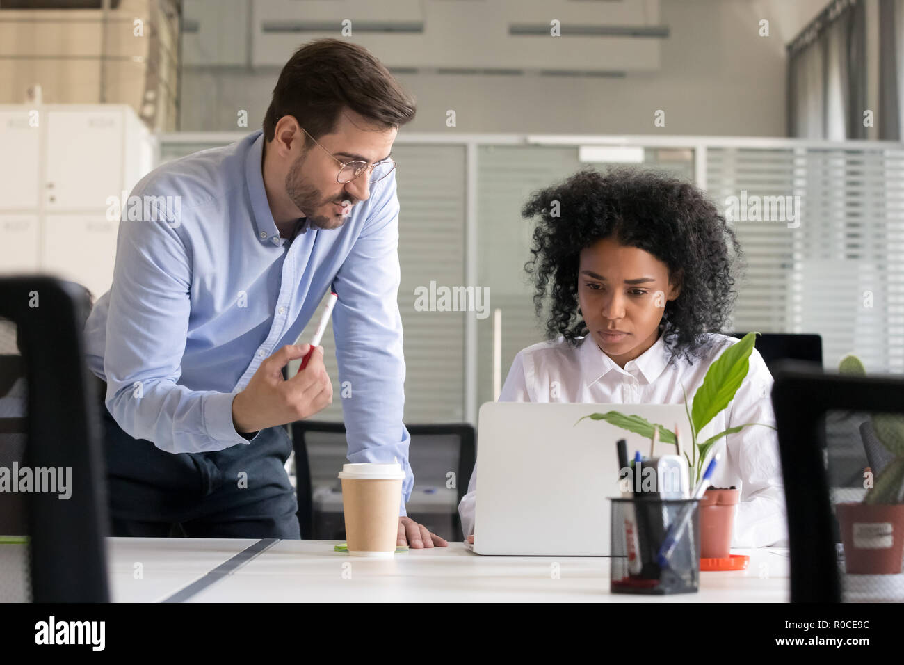 Speaking into computer hi-res stock photography and images - Alamy