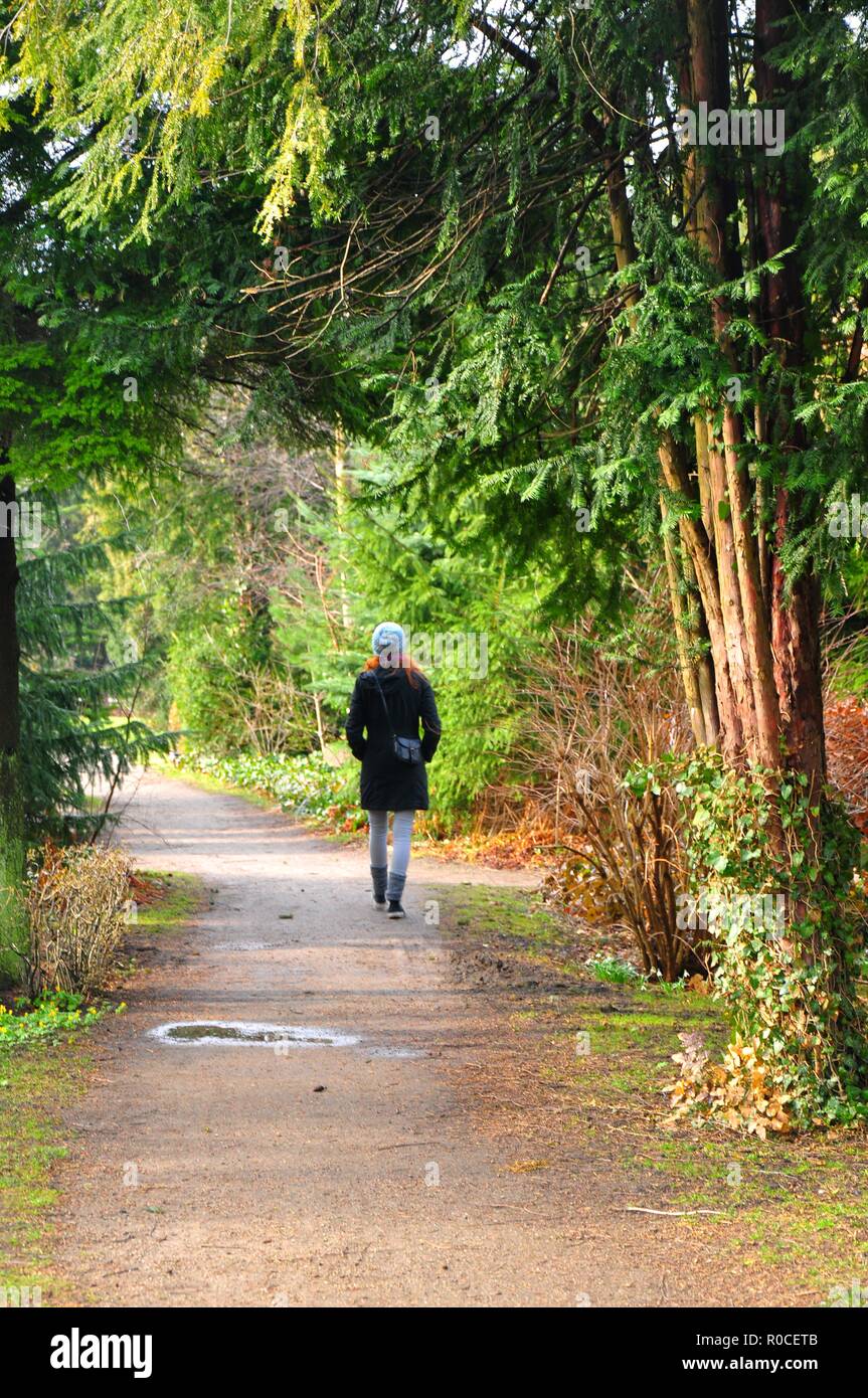 Girl having a walk in a park Stock Photo - Alamy
