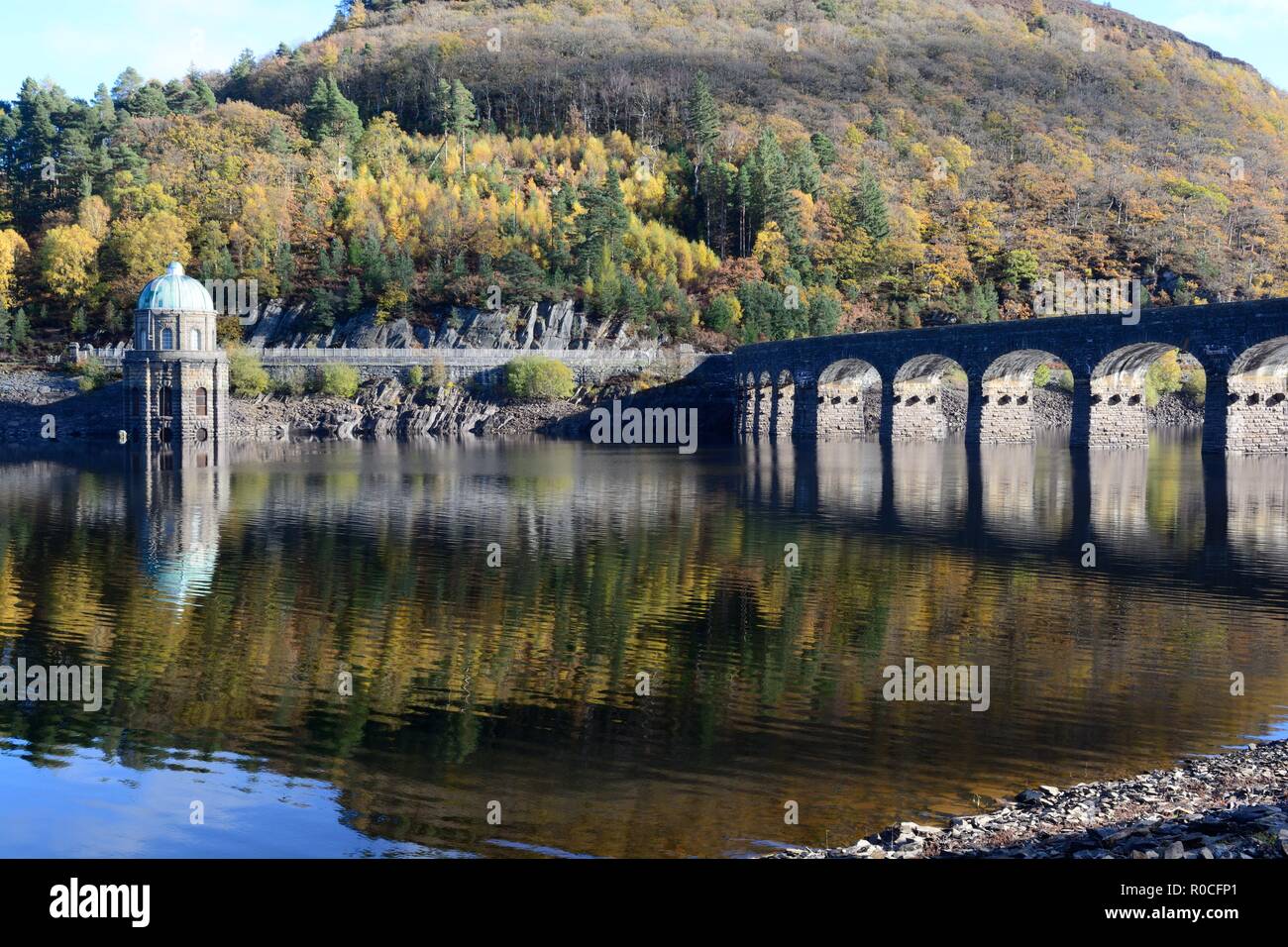 Stone road bridge viaduct over Garreg Ddu Dam Reservoir Elan Valley ...