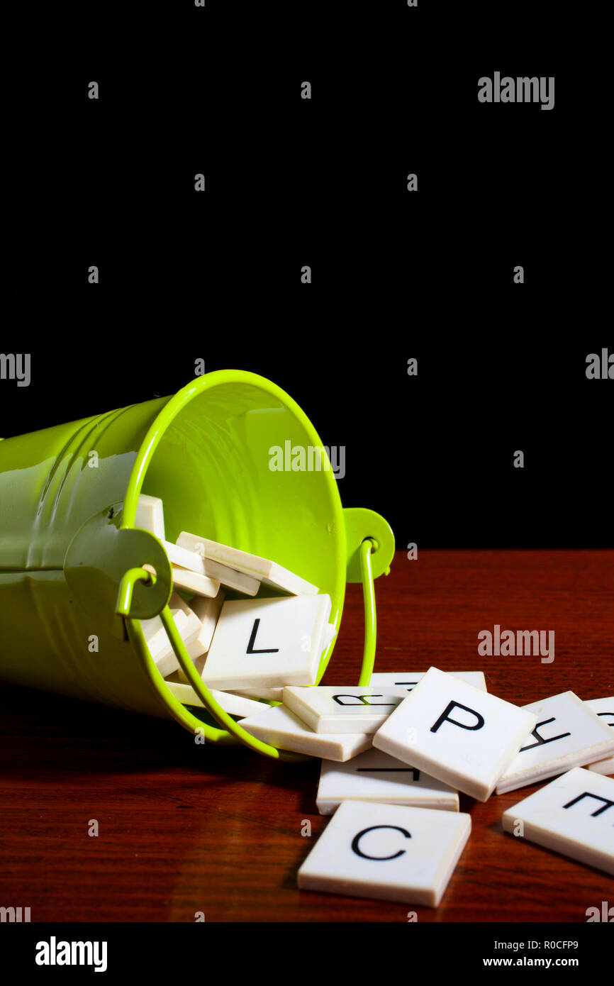 letter blocks in a bucket Stock Photo - Alamy
