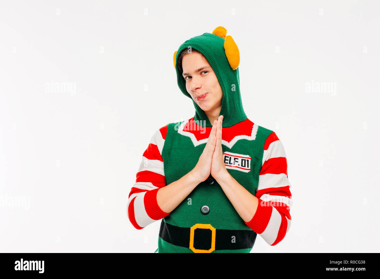Attractive young men teenager in elf costume on white background Stock ...