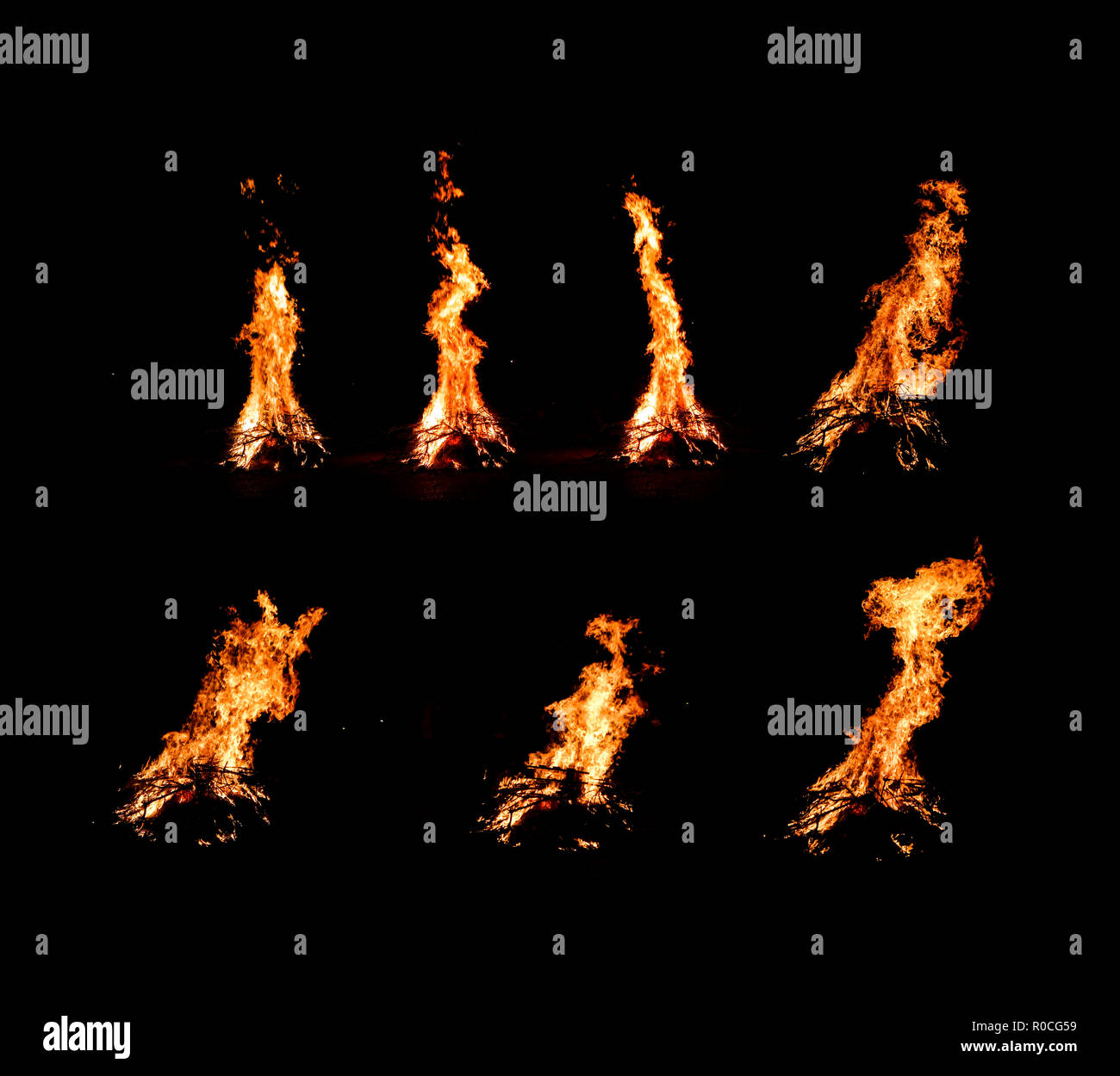 Seven different Fire flames isolated on a black background in the dark ...