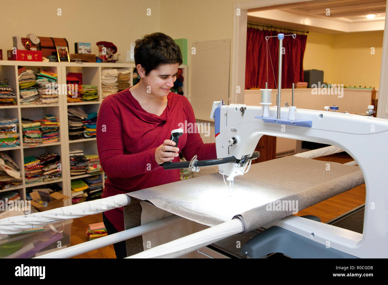 Woman works on sewing machine hi-res stock photography and images - Alamy