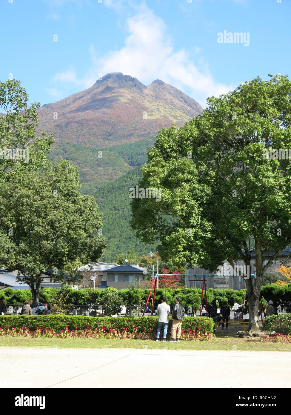 A view of the Japanese town of Yufuin, with Mount Yufu in the ...