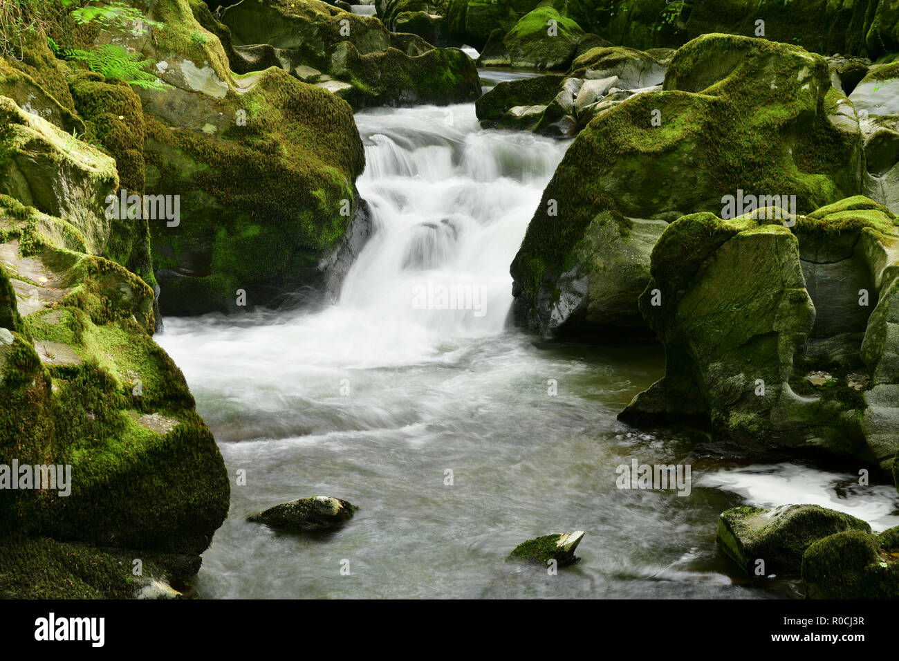 Long exposure of a waterfall at Watersmeet in Devon Stock Photo - Alamy
