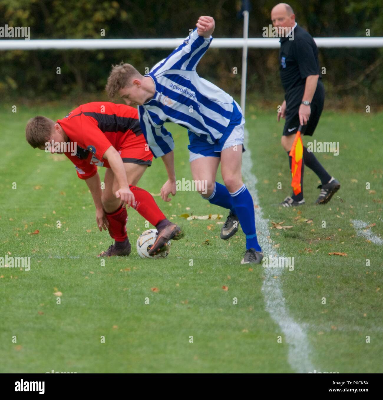 Football action from an amateur match between Whaley Bridge Athletic ...