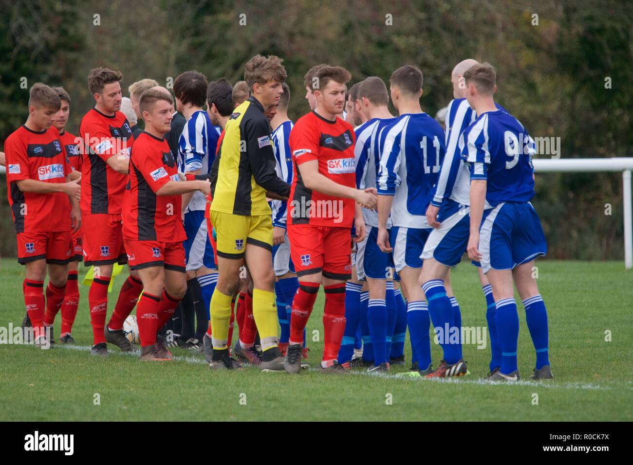 Players shake hands before the amateur football match between Whaley ...