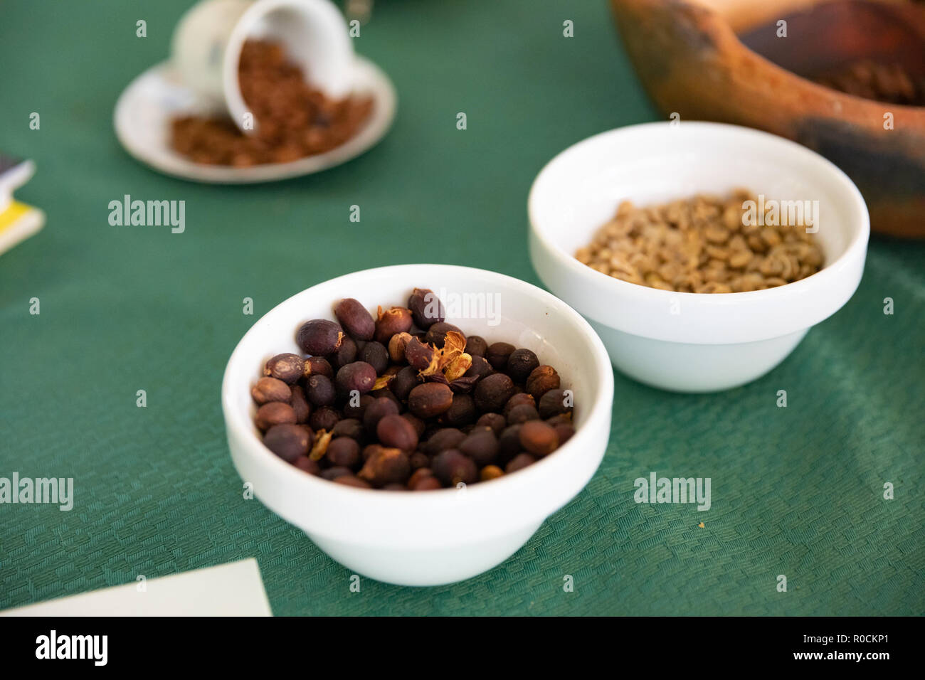 Bowls of beans showing the process of coffee production Stock Photo - Alamy