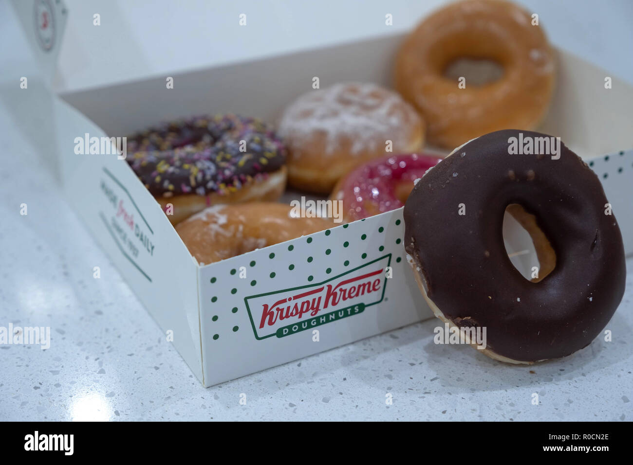 Krispy Kreme doughnuts in a box Stock Photo - Alamy