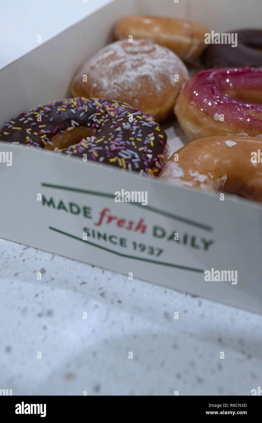 Krispy Kreme doughnuts in a box Stock Photo - Alamy