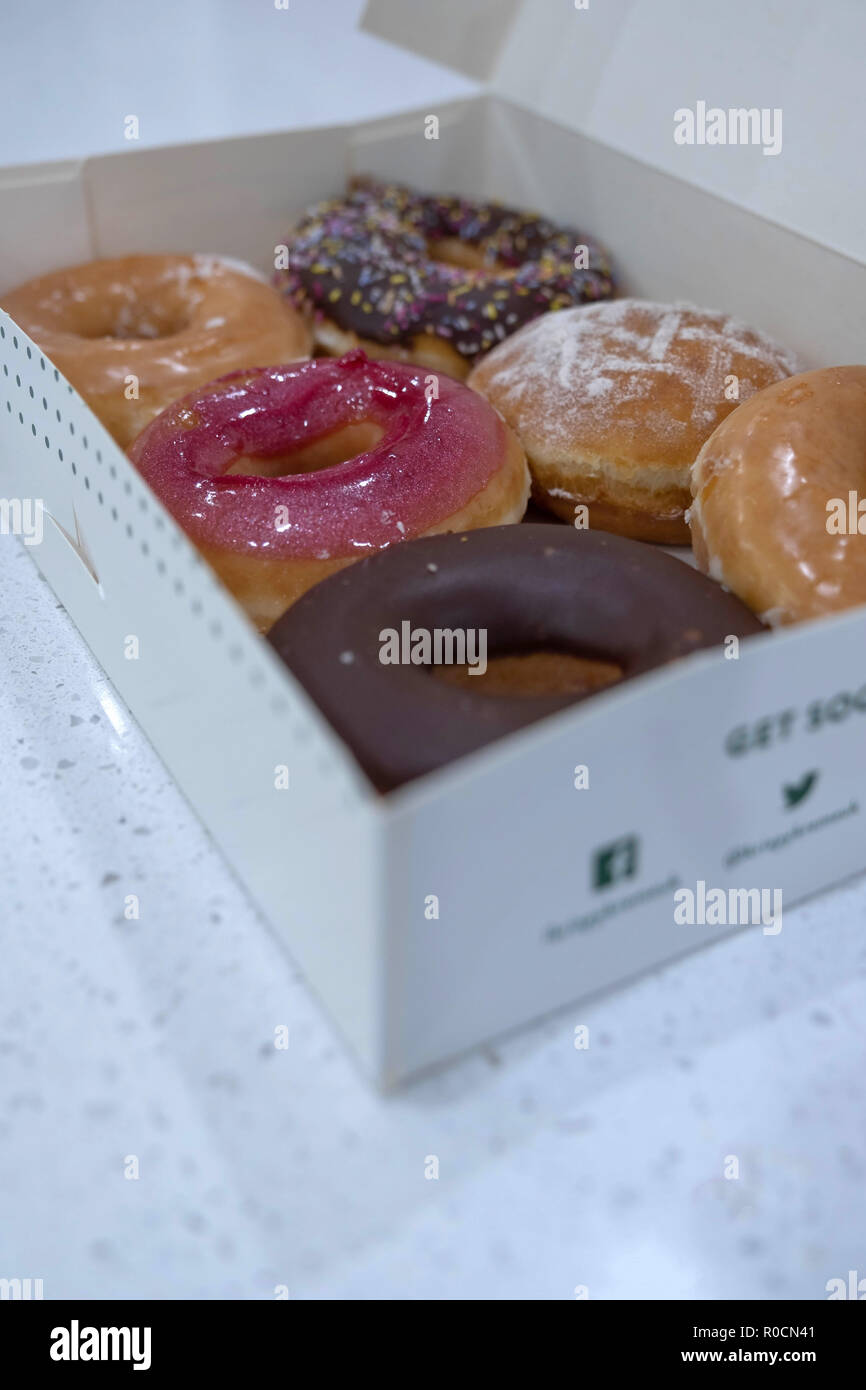 Krispy Kreme doughnuts in a box Stock Photo - Alamy