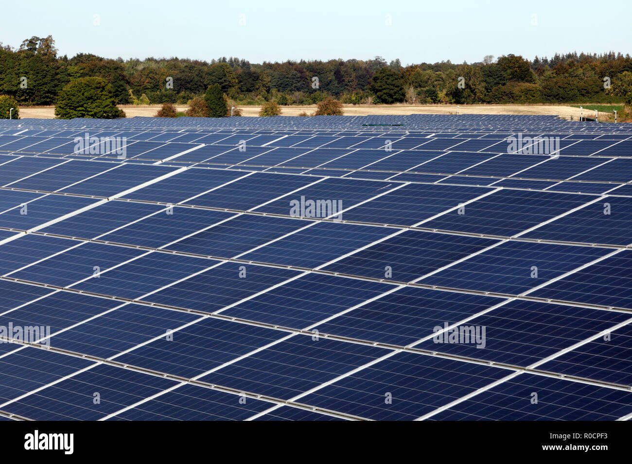 Banks of Solar panels at Kencot Hill solar energy farm, sited on the ...