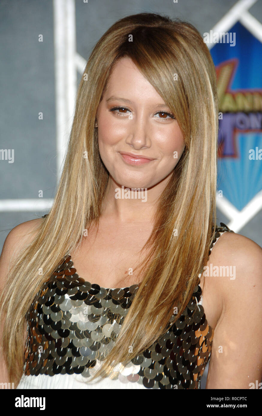 Ashley Tisdale arriving at the HANNAH MONTANA Miley Cyrus Premiere at ...